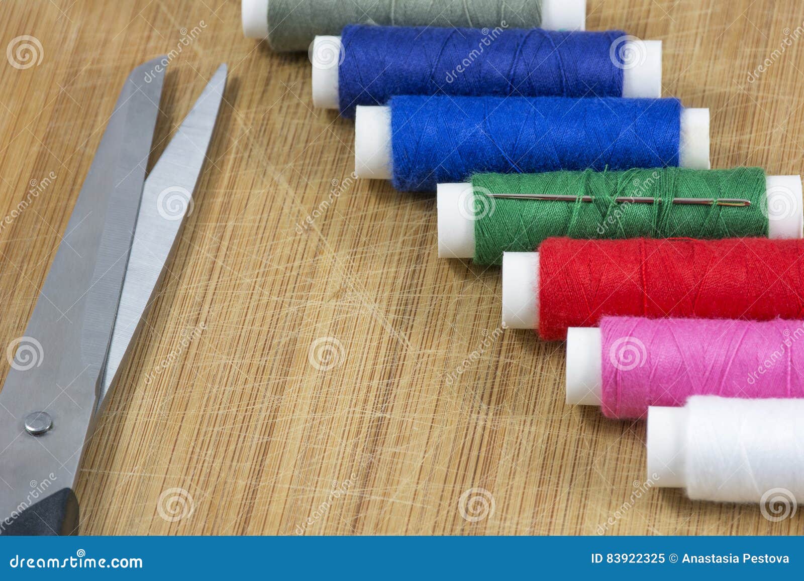 Line of Colourful Threads with Scissors Stock Image - Image of ...