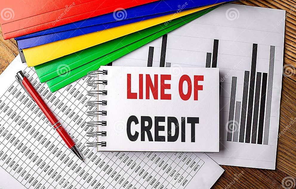 LINE of CREDIT Text on Notebook with Pen, Folder on a Chart Background ...