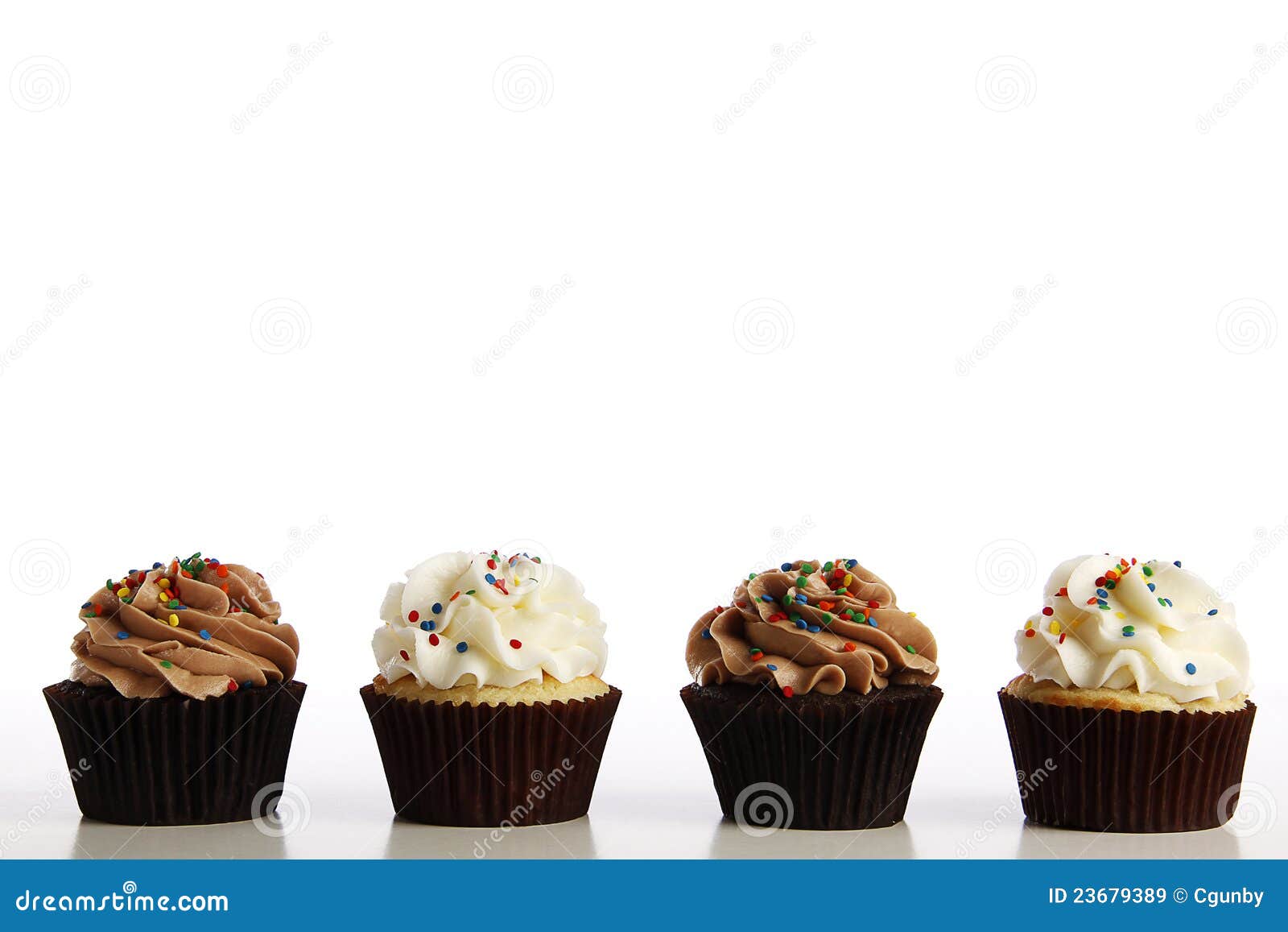 Line of Cupcakes stock image. Image of chocolate, gourmet - 23679389