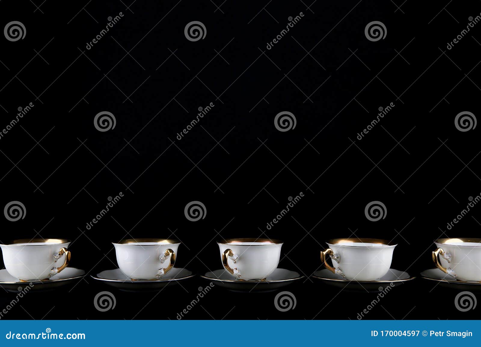 Line of Cups on a Black Background Stock Image - Image of shiny, line ...