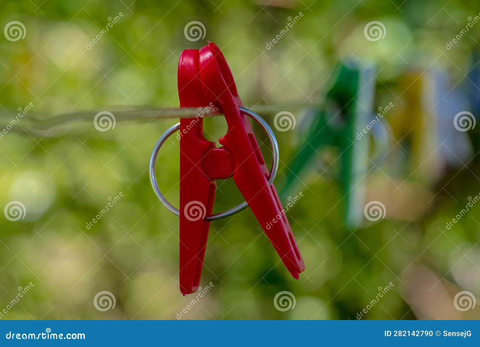 Red Clothes Peg on a Rope . Stock Photo - Image of rope, pink: 282142790