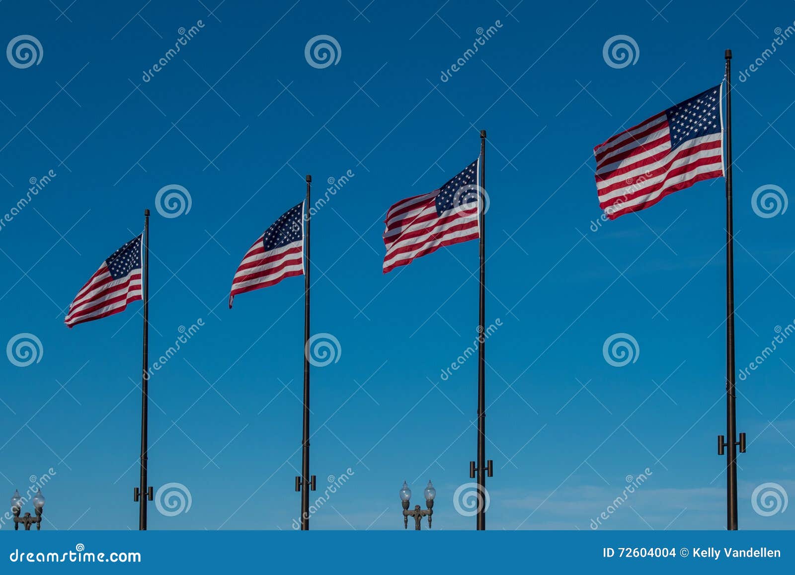 Line of Four American Flags Waving on Blue Sky Stock Photo - Image of ...