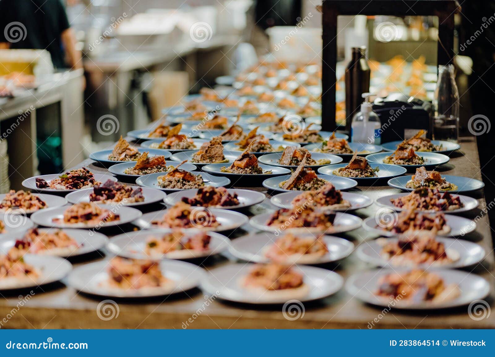 Line of Freshly Prepared Entrees Waiting To Be Served on a Buffet Table ...