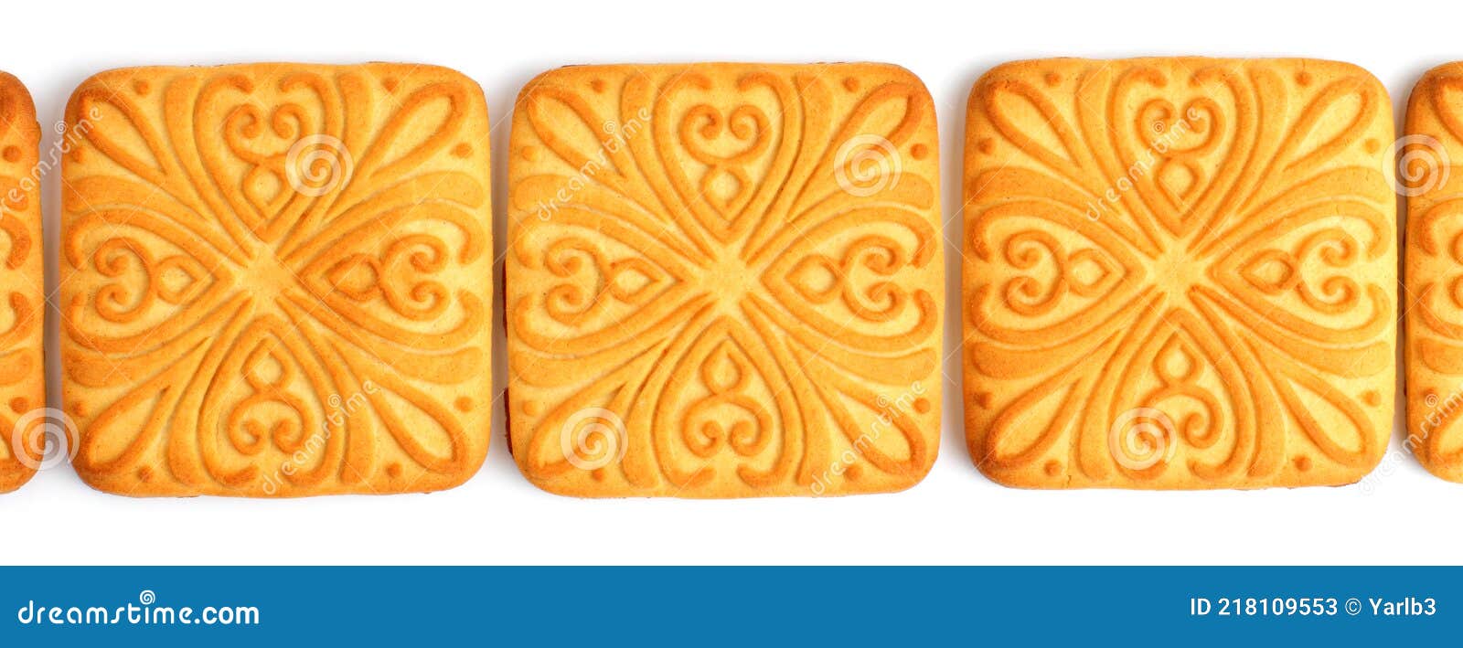 A Line of Homemade Biscuits Close-up on a White Background, Wide View ...