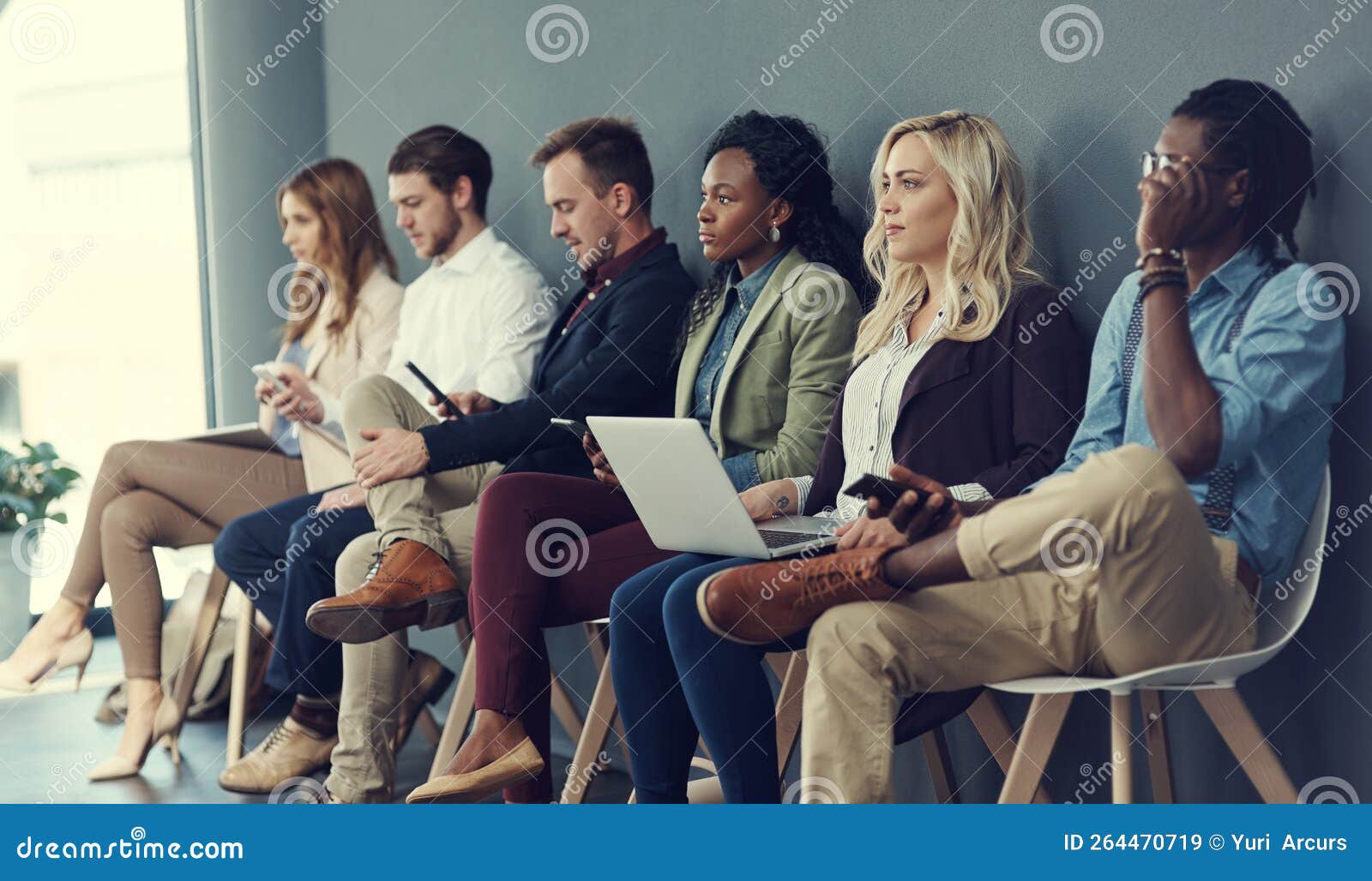 In the Line for the Interview. a Group of Businesspeople Using ...