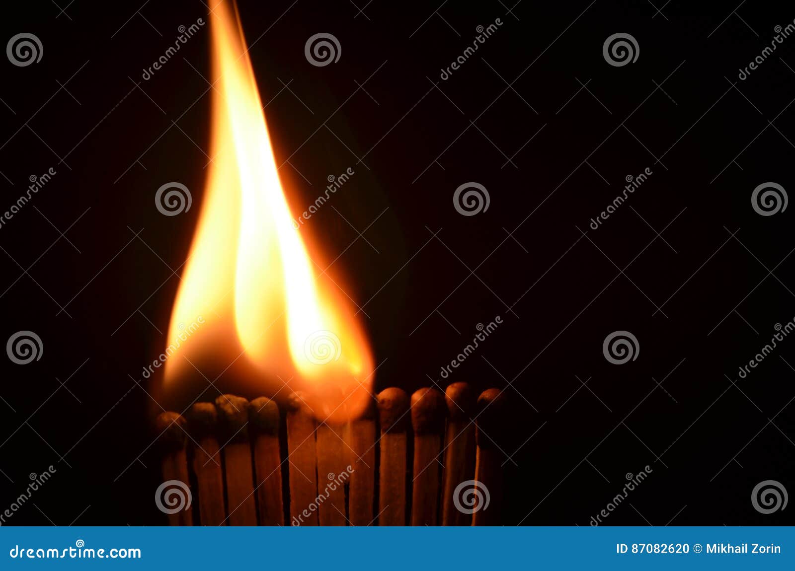 Line of Lighted Matches on Black Background Stock Photo - Image of ...