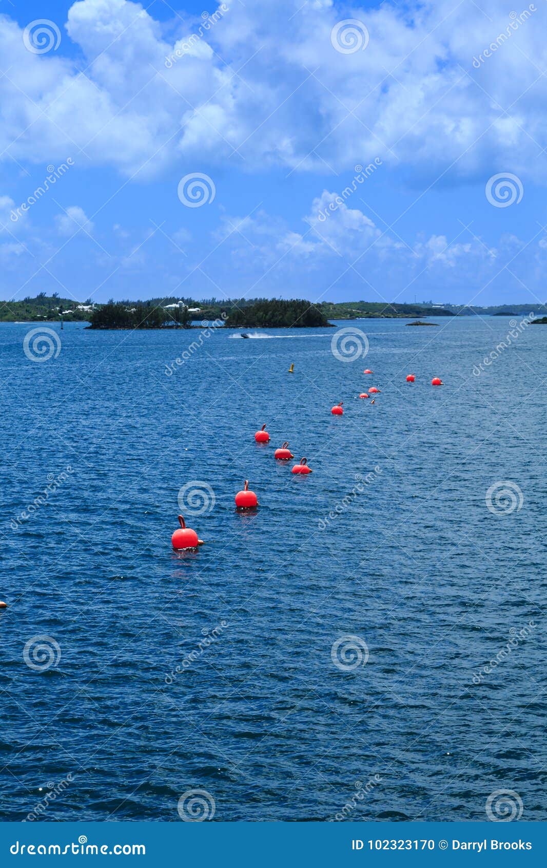 Orange Floats in Blue Water Stock Photo - Image of markers, floats ...