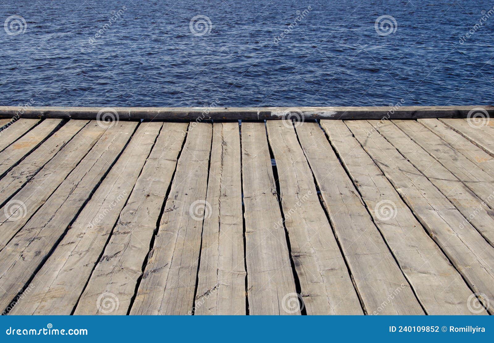 The Line between a Plank Pier and Water. Beautiful Background. Stock ...