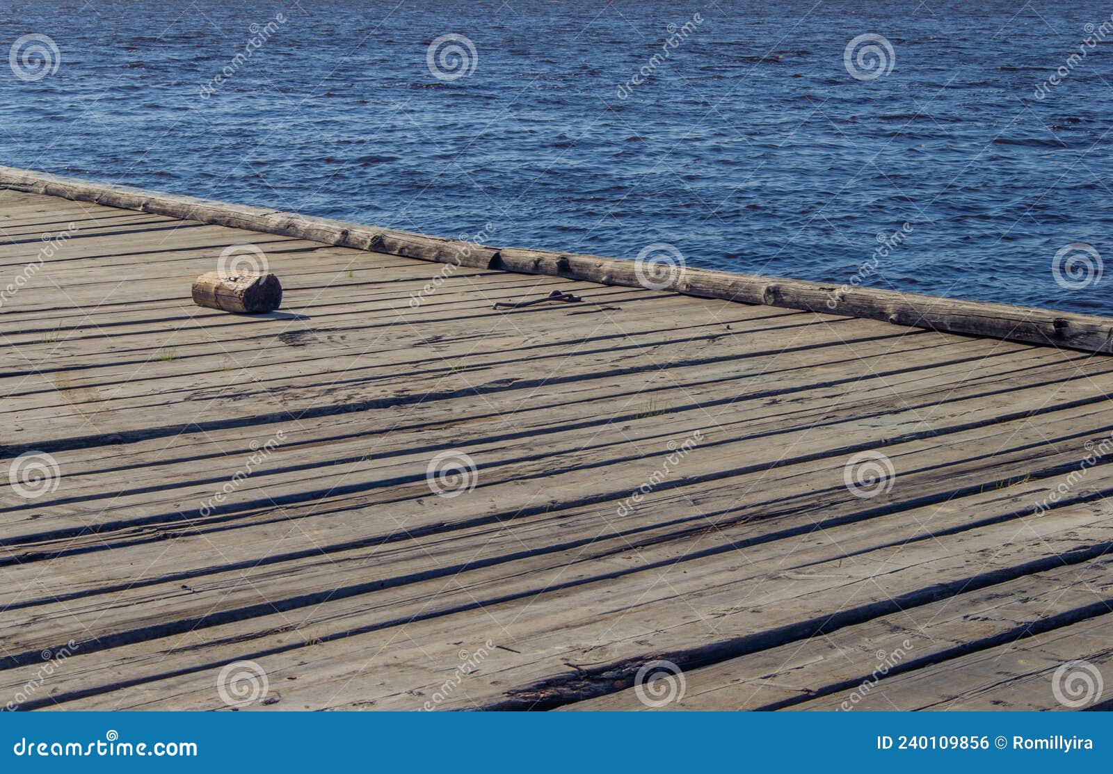 The Line between a Plank Pier and Water. Beautiful Background. Stock ...