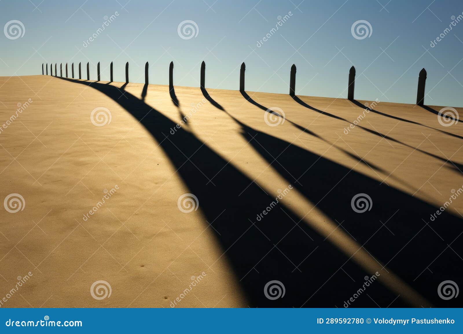 Line of Poles Casting Long Shadows on Sandy Beach. Generative AI Stock ...