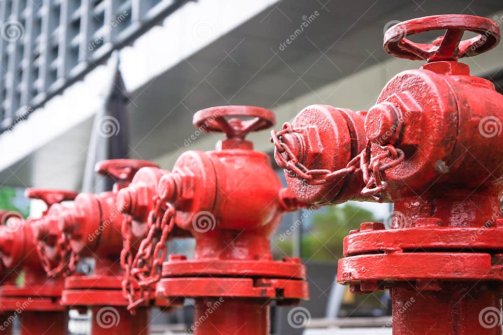 A line of red fire hydrant stock image. Image of fireman - 60656545