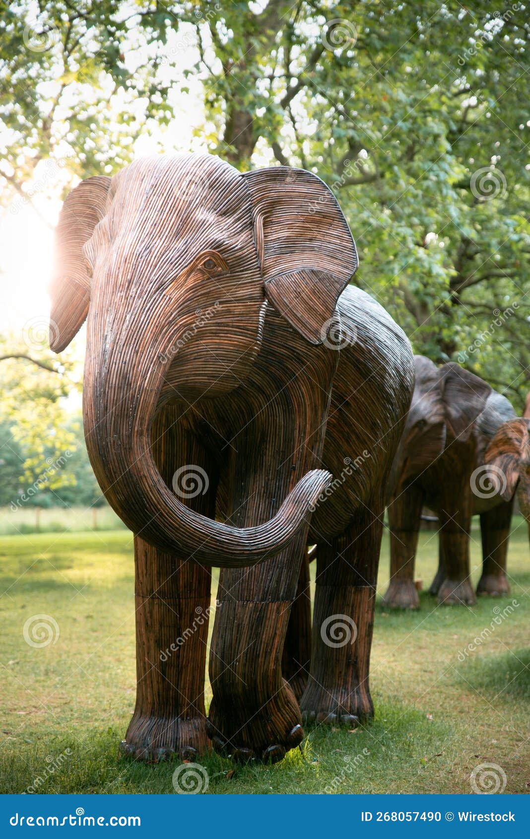 Line of Sculptured Elephants in the Garden, Vertical Shot Stock Photo ...
