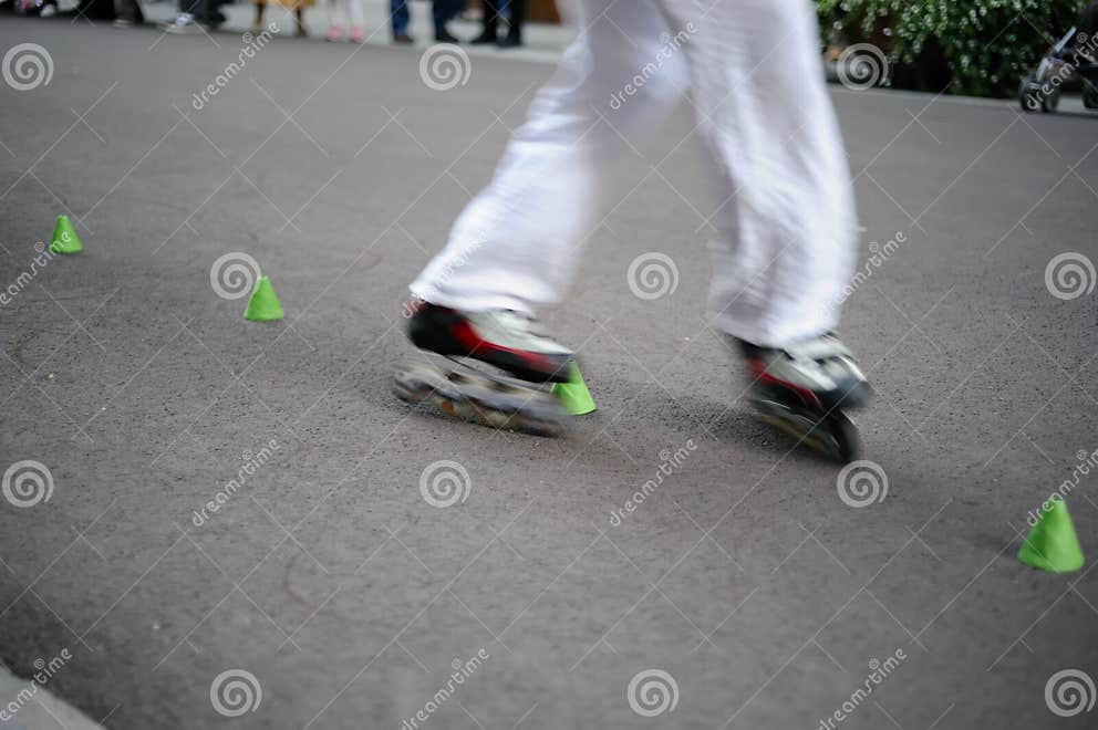 In-line skating slalom stock image. Image of sport, skating - 10926813