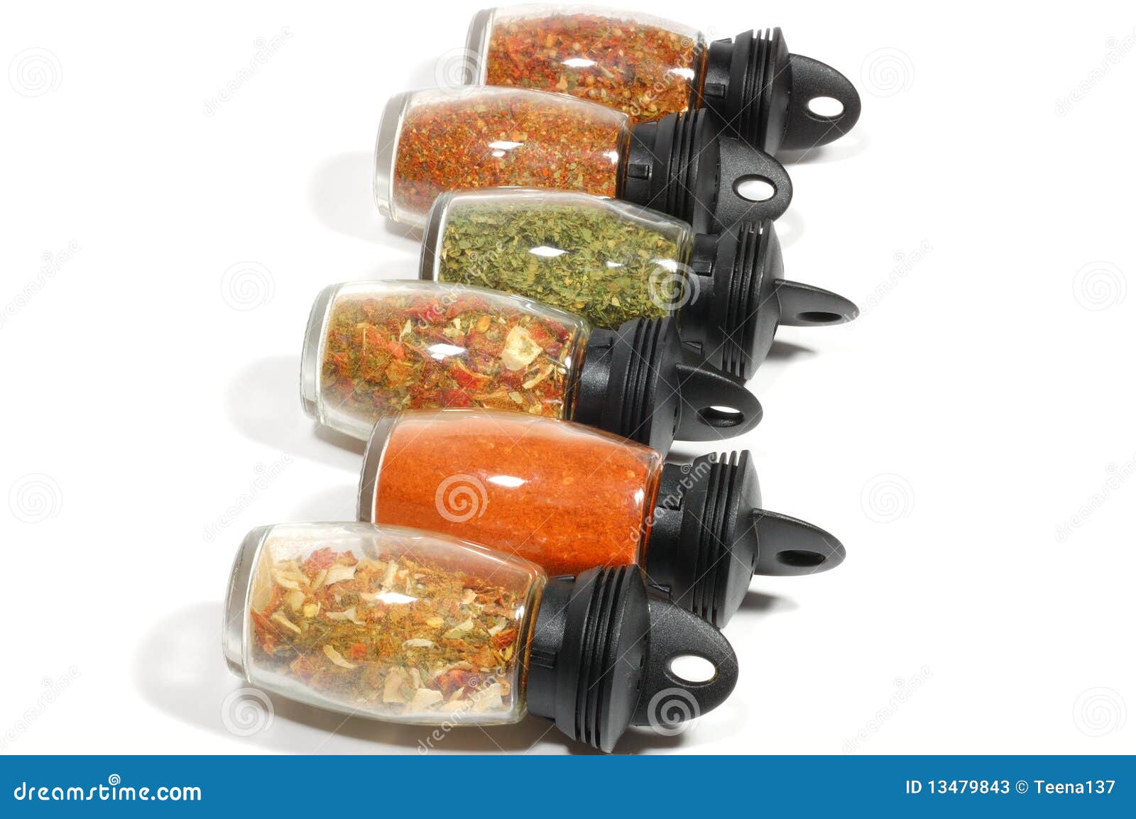 Line of Spices Glass Bottles Stock Image - Image of white, powder: 13479843
