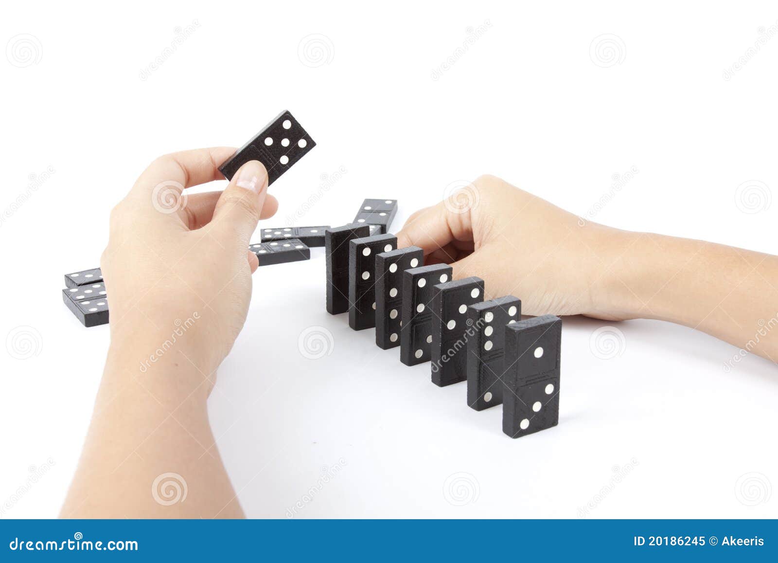 Line Of Dominos With One Standing Out From The Line. Royalty-Free Stock ...