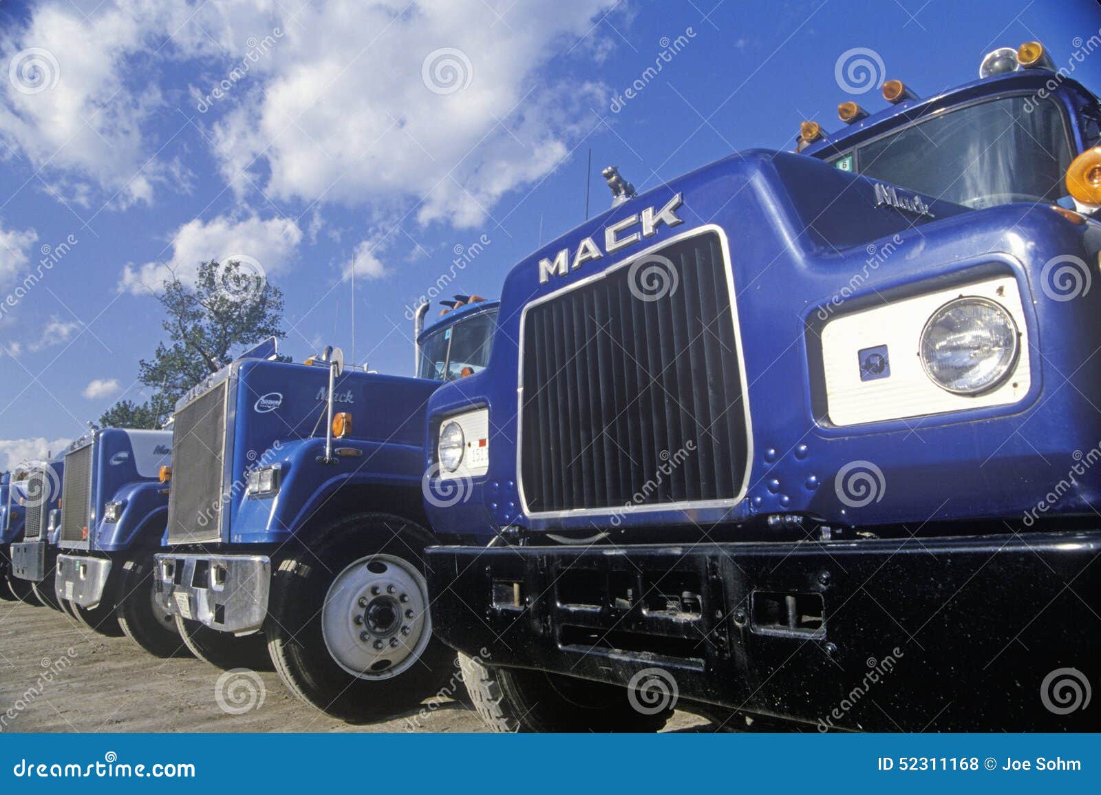 A line up of Mack trucks editorial stock photo. Image of industry ...