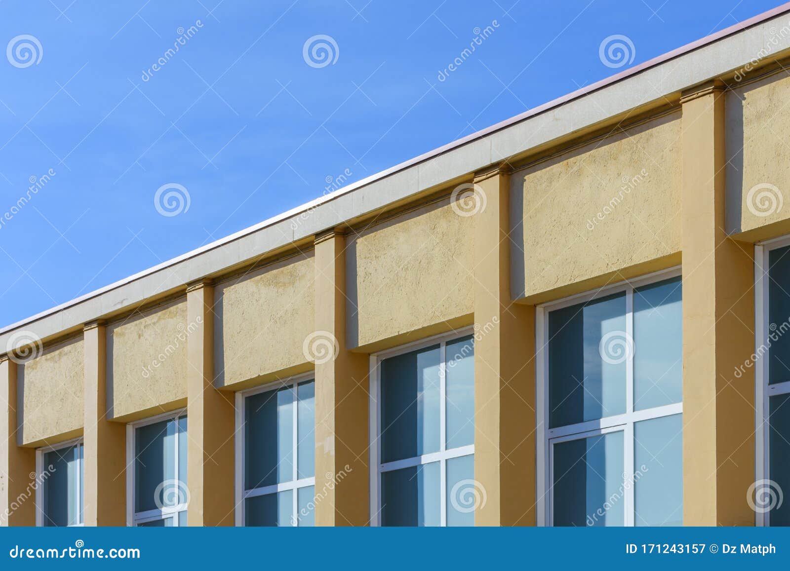 Line of Windows in a Yellow Building Stock Image - Image of lines ...