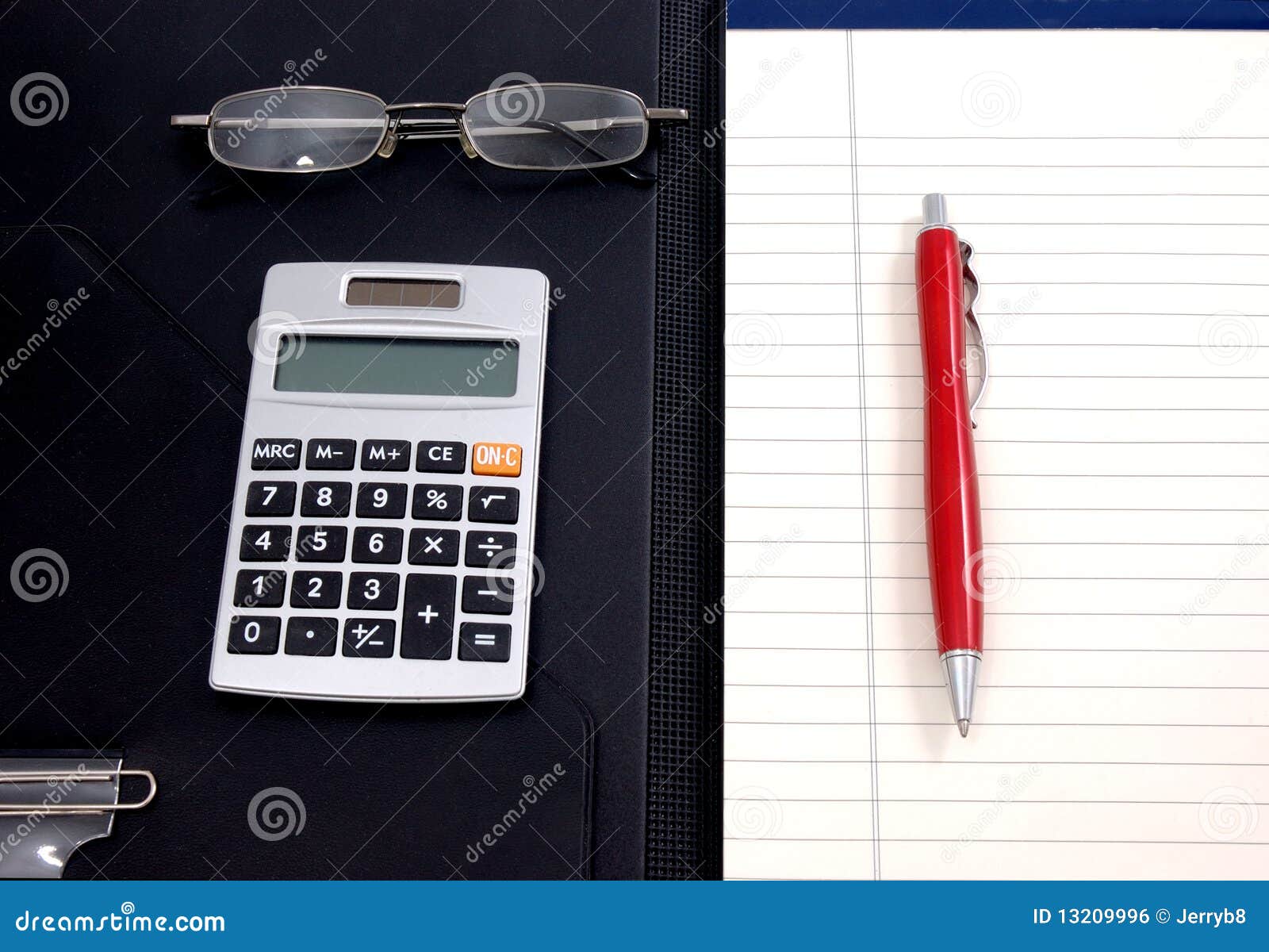 Lined Paper and Calculator stock photo. Image of paper - 13209996