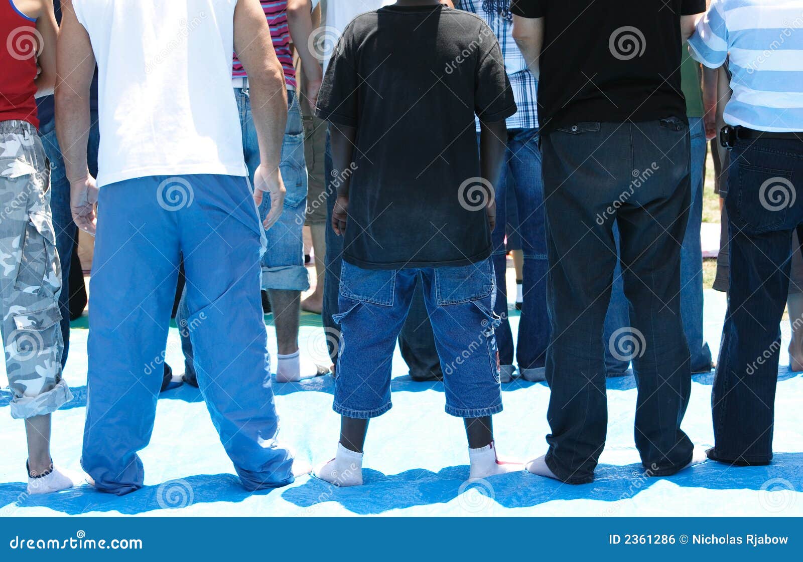 Lined Up stock photo. Image of trousers, people, males - 2361286