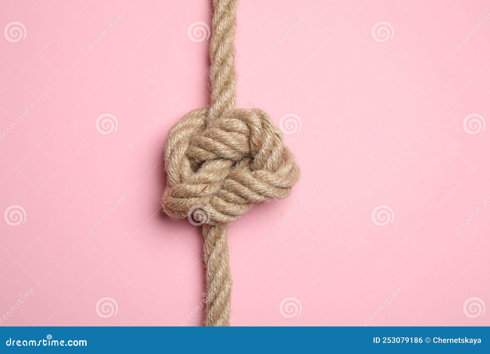 Linen Rope with Knot on Pink Background, Top View. Unity Concept Stock ...