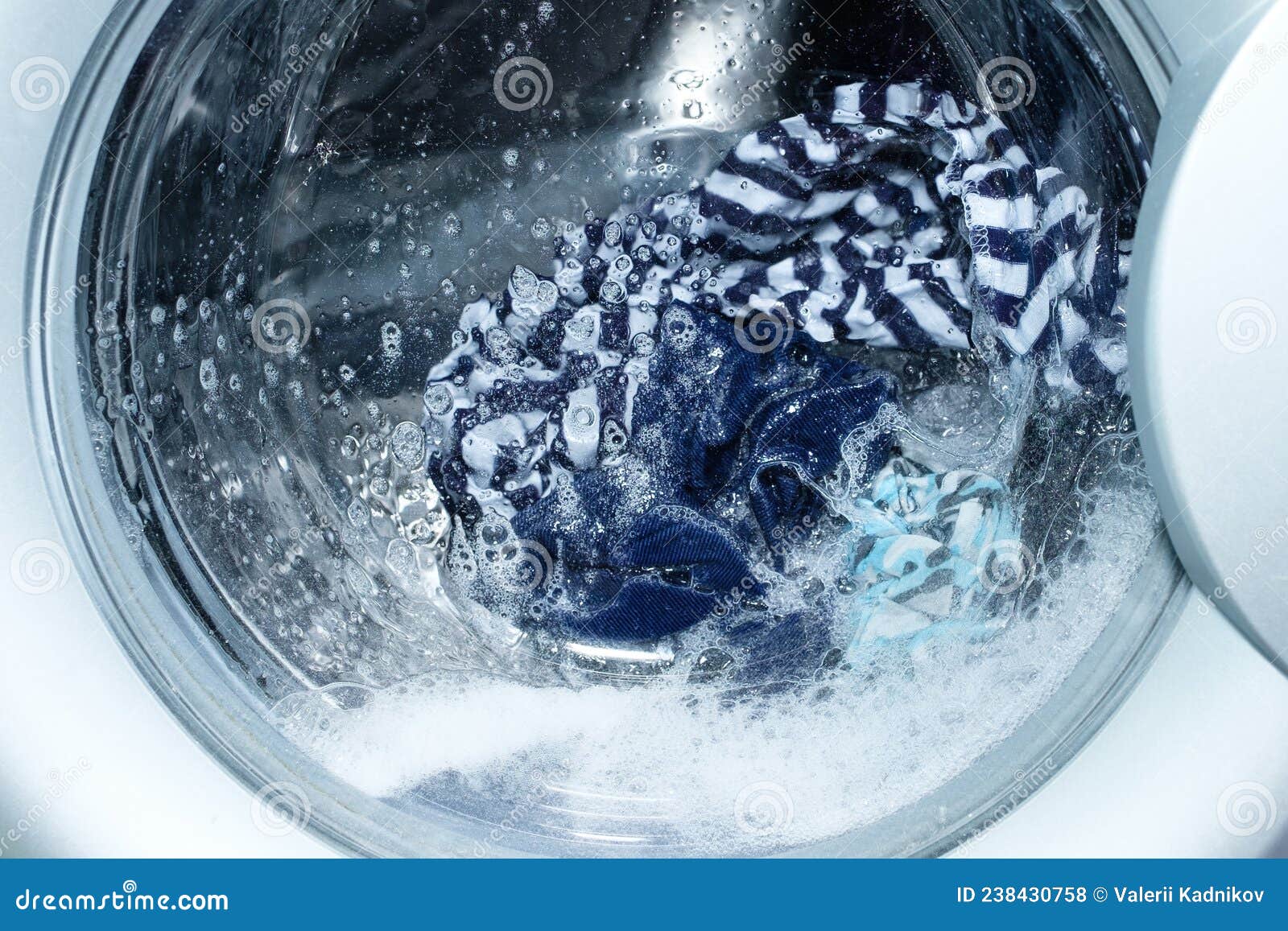 Linen Washing in the Washing Machine Stock Photo - Image of bubbles ...