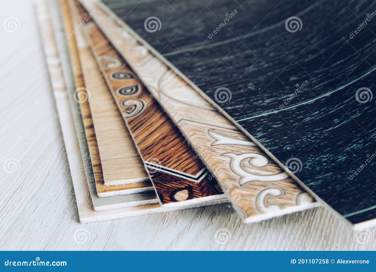 Linoleum Cut into Pieces. Samples of Flooring in a Bundle Stock Photo ...