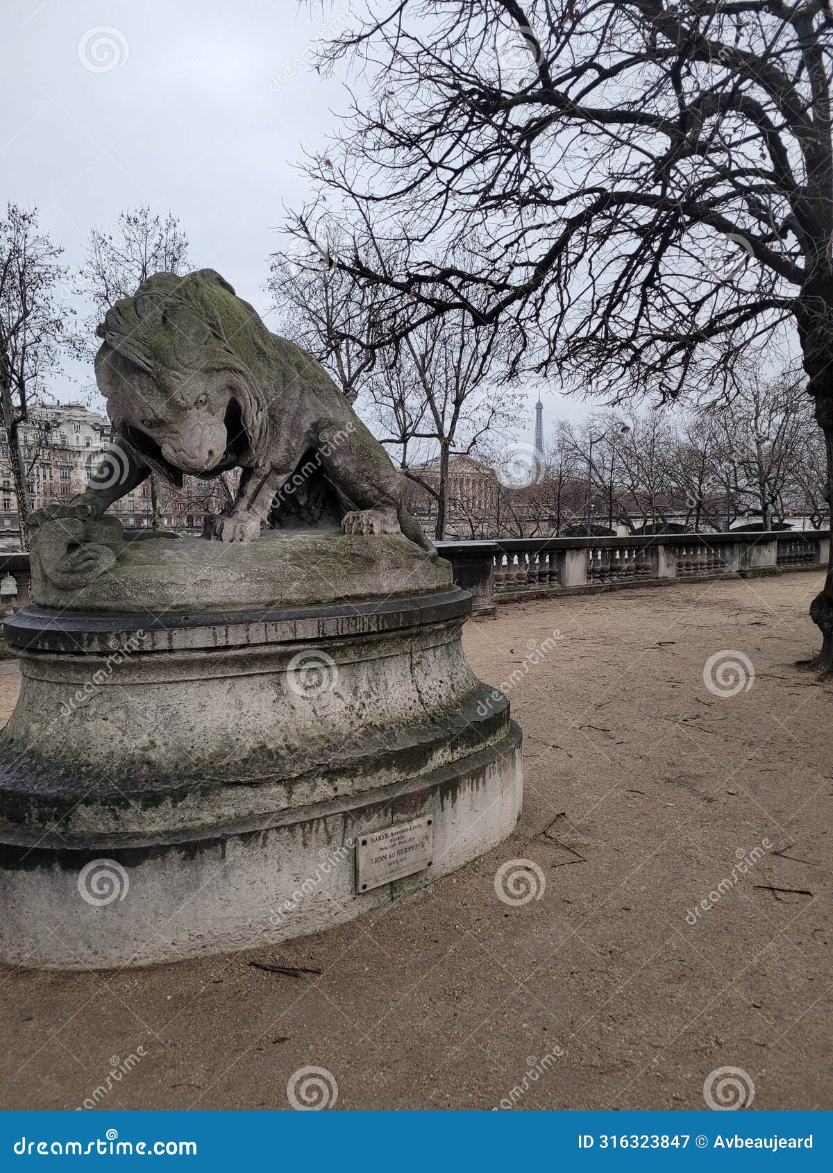 Lion in the Front of Eiffel Tower, Paris, France. Editorial Photography ...