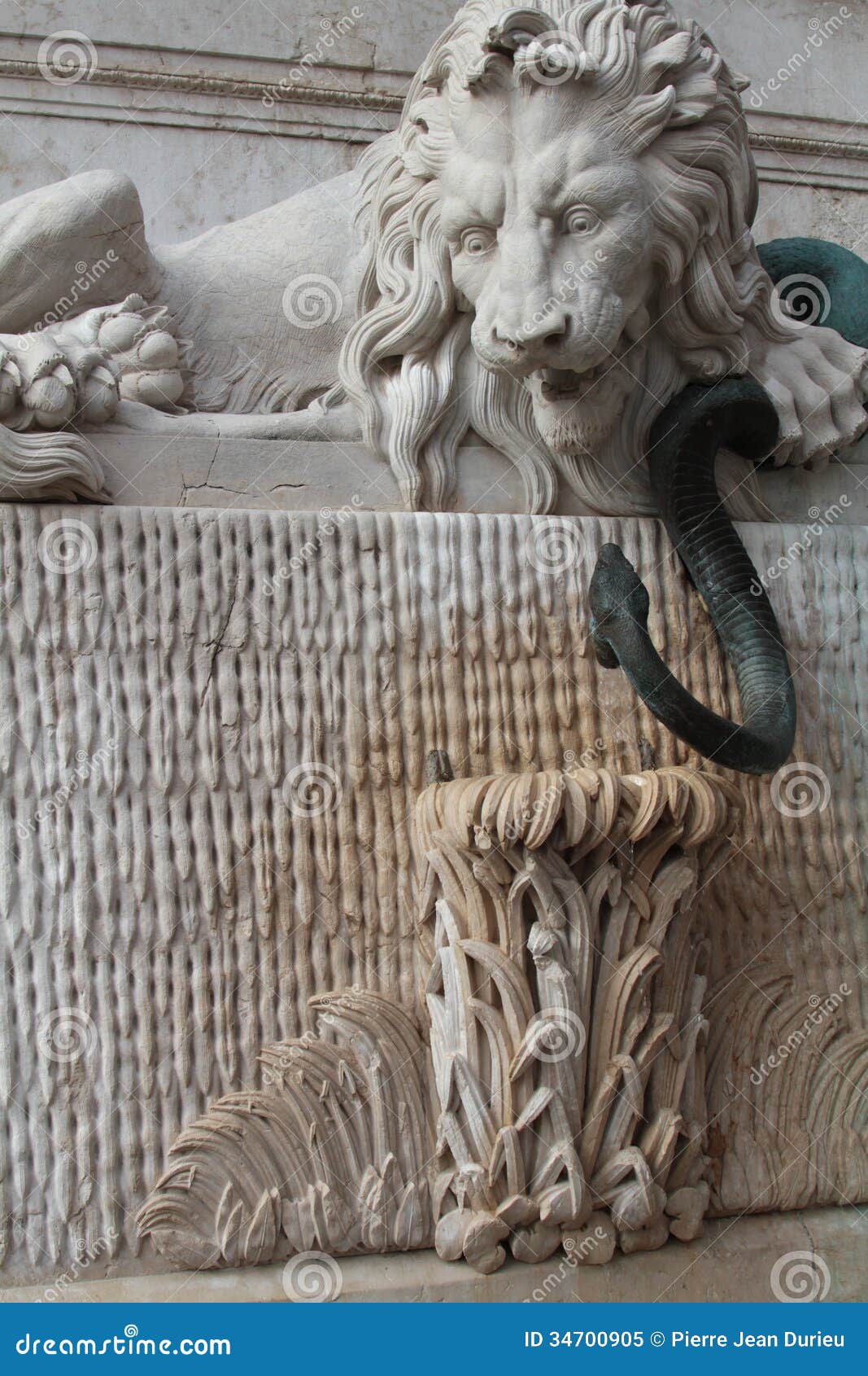 Lion and a Snake in Grenoble Stock Image - Image of visit, snake: 34700905