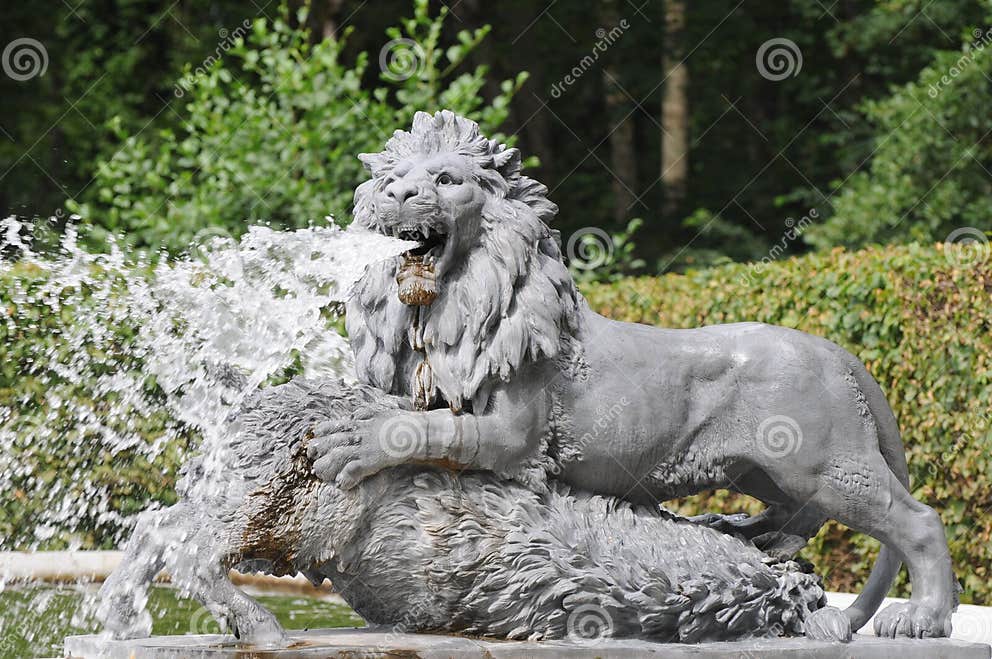 Lion Statue Spitting Water stock photo. Image of palace - 37633034