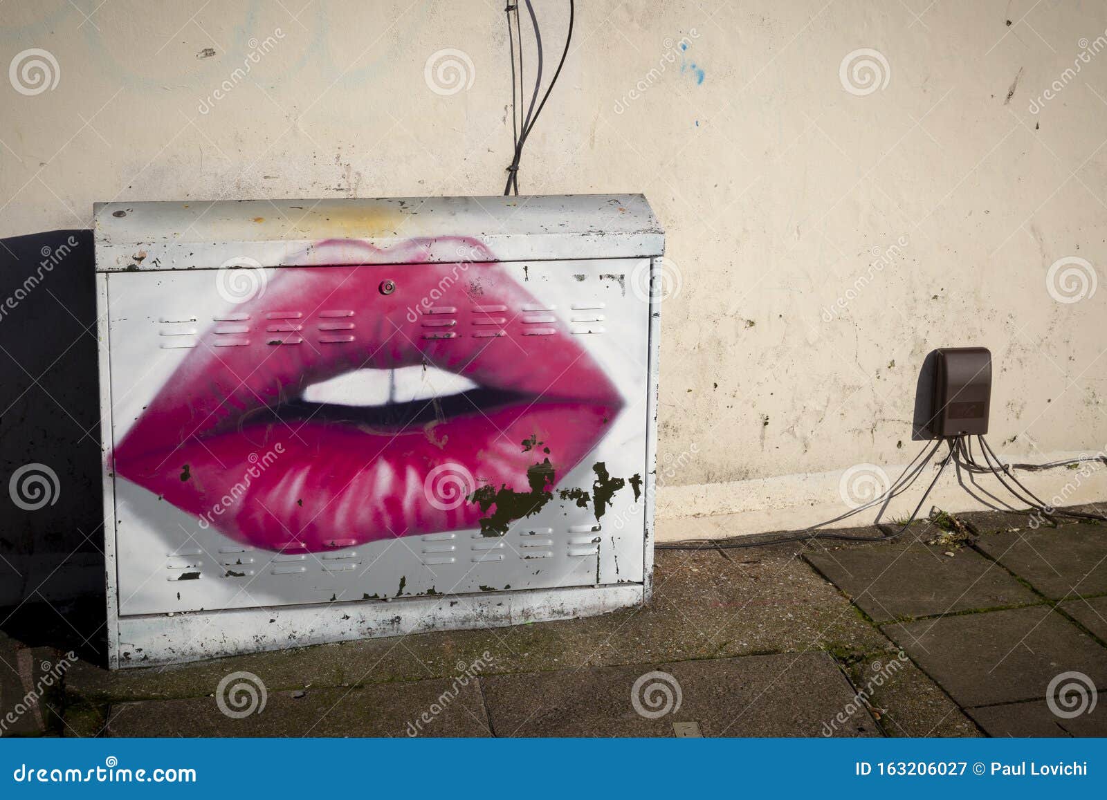 Lips on an phone cable box editorial photography. Image of brighton ...