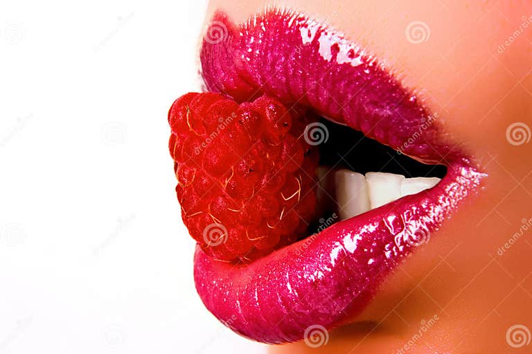 Lips with a raspberry stock photo. Image of fruit, lush - 8724504