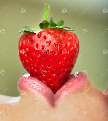 Lips with strawberry. stock photo. Image of lipstick - 44430084