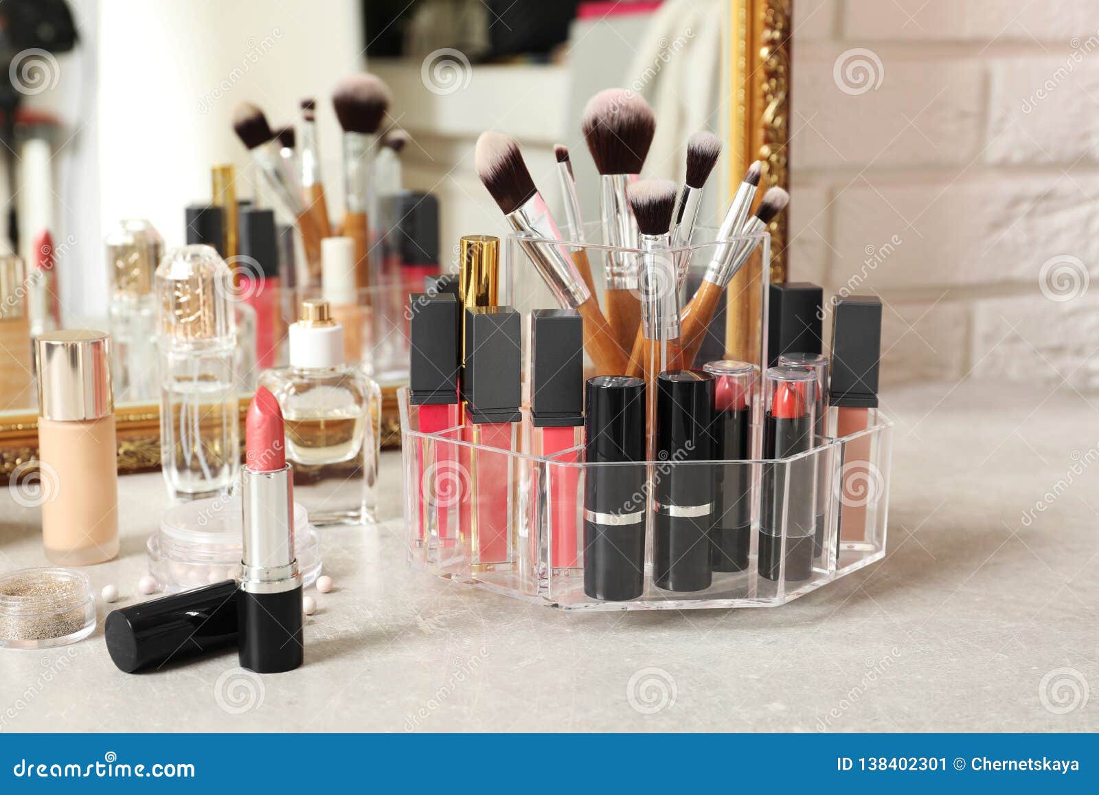 Lipstick Holder with Different Makeup Products on Dressing Table Stock ...