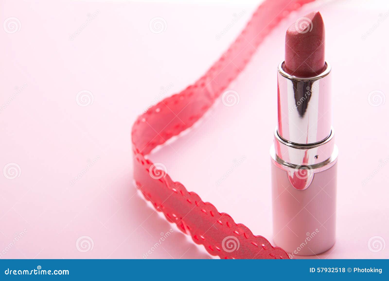 Lipstick and ribbon stock photo. Image of silver, curly - 57932518