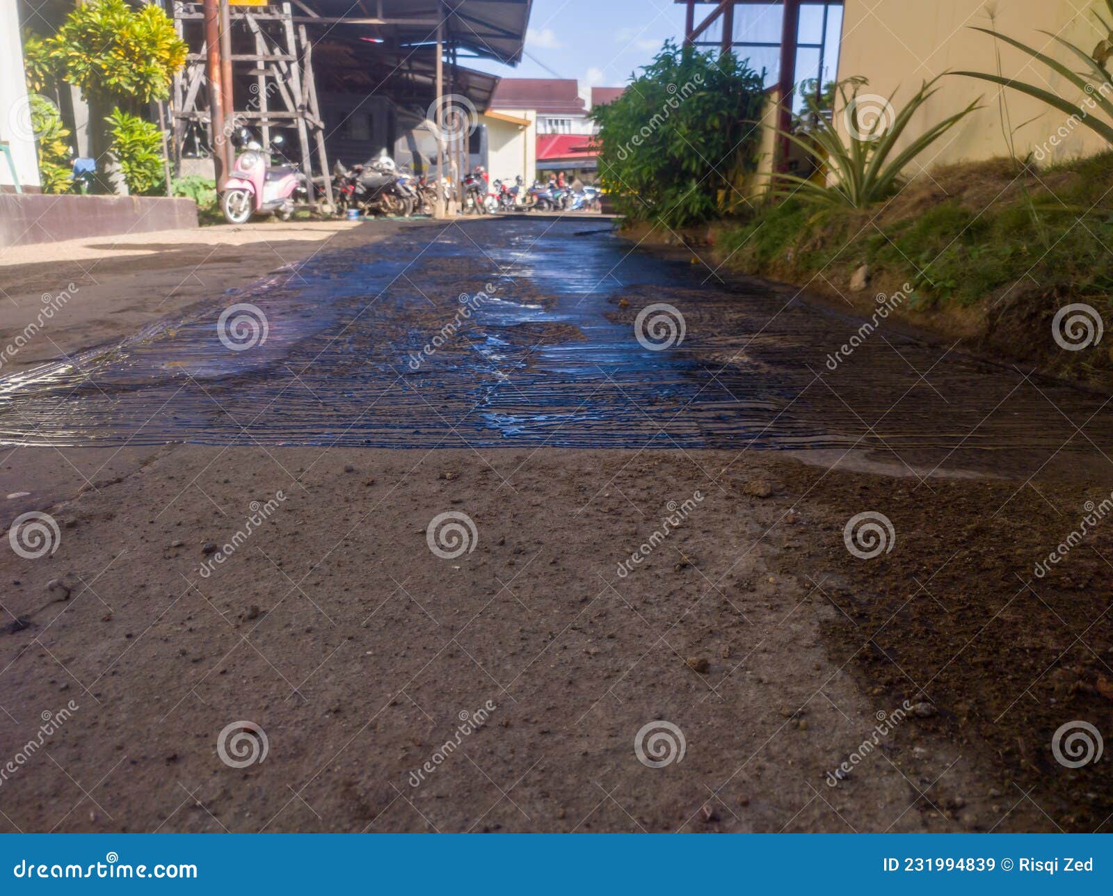 Liquid Asphalt that Has Been Splashed Onto the Road Stock Image - Image ...