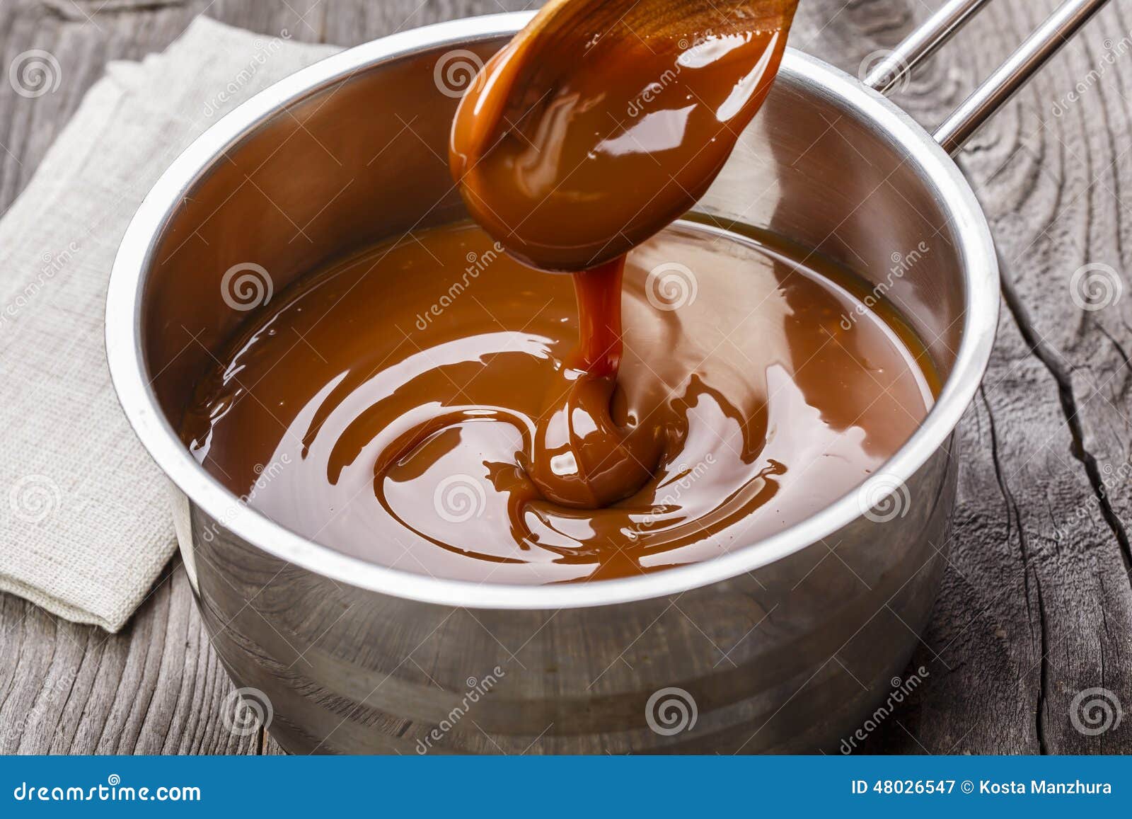 Liquid caramel is poured stock image. Image of sticky - 48026547
