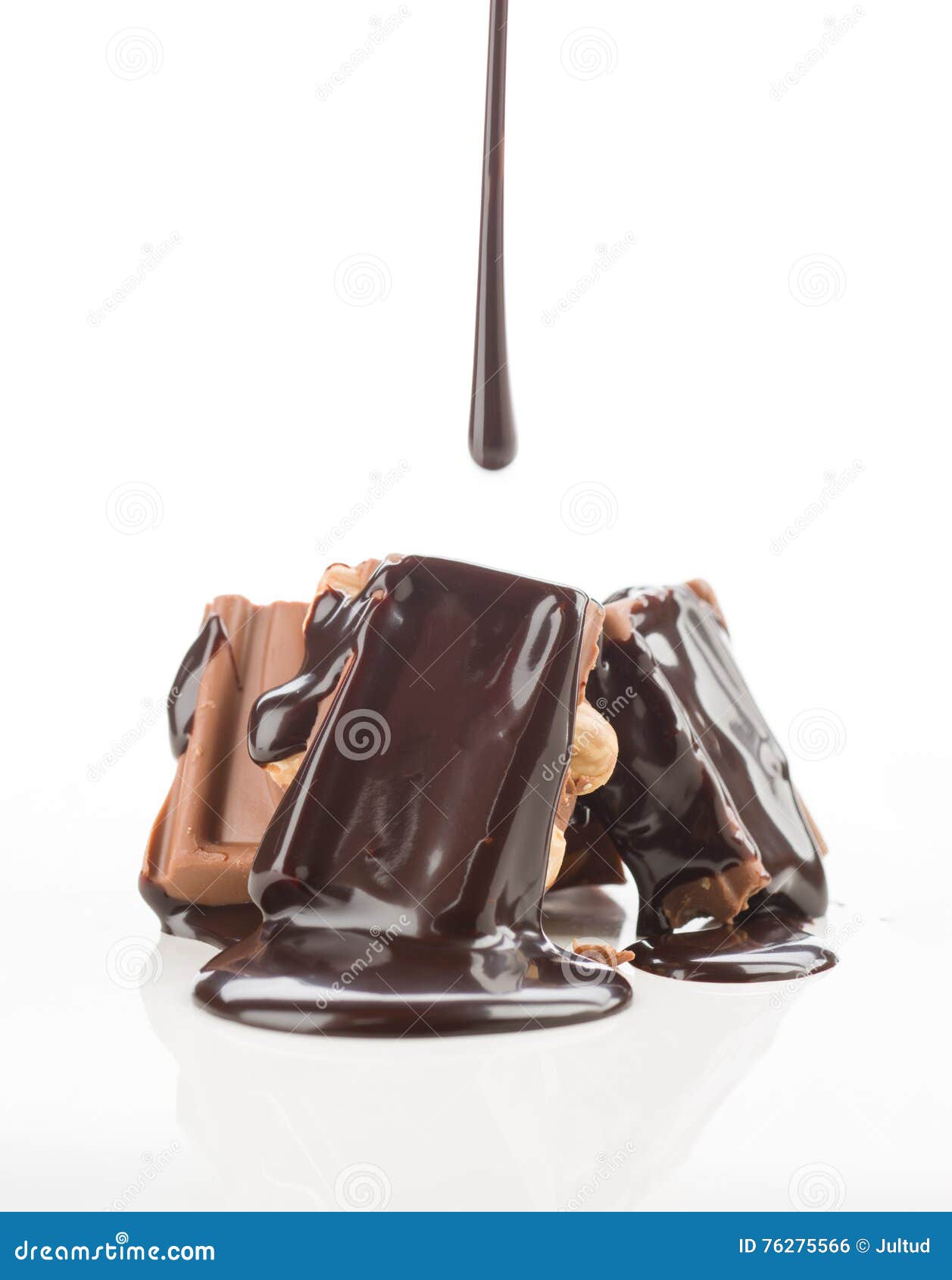 Liquid Chocolate, Falling into Pieces of Chocolate on White Stock Photo ...
