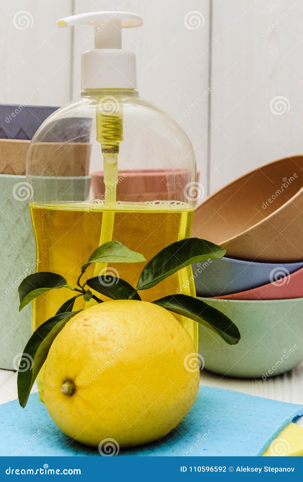 Liquid detergent and lemon stock photo. Image of home - 110596592