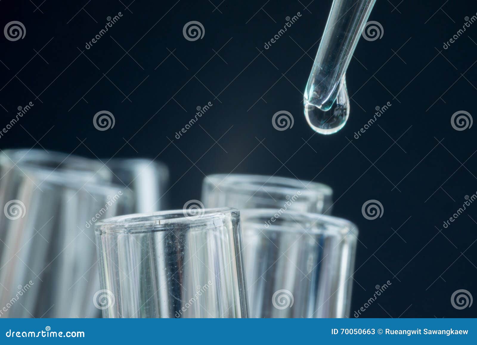 Liquid drop on test tube stock image. Image of flask - 70050663