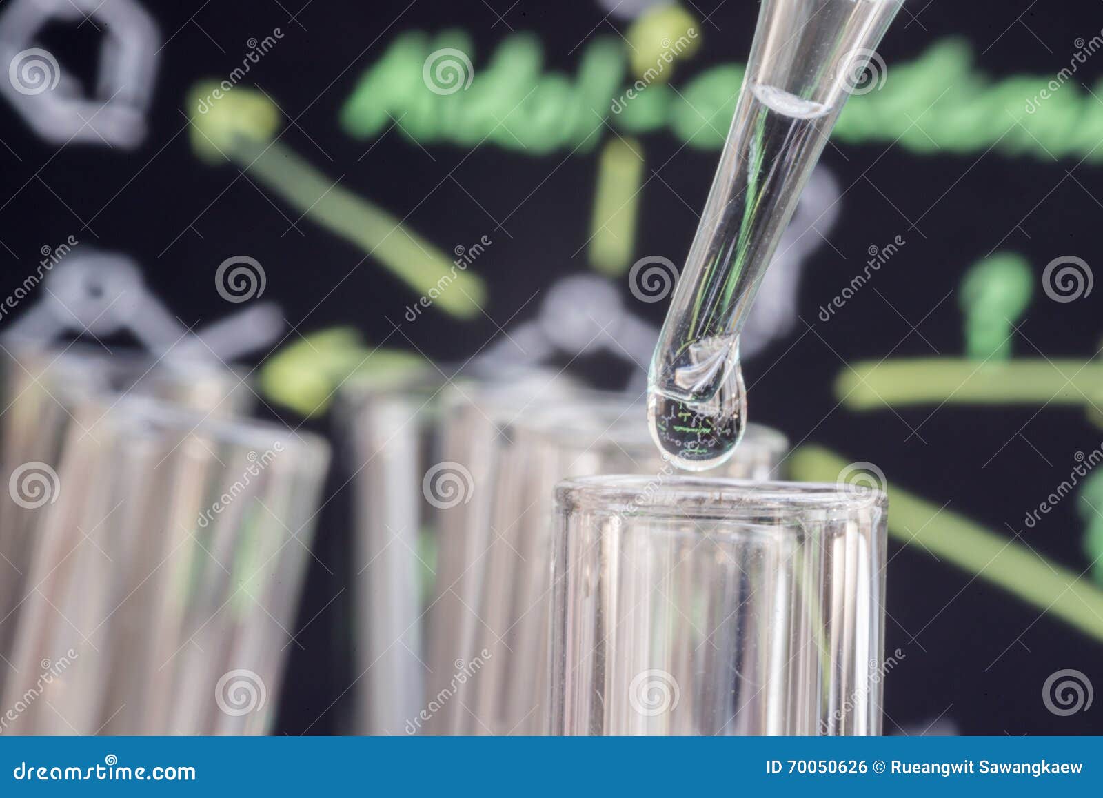 Liquid drop on test tube stock photo. Image of microbiology - 70050626