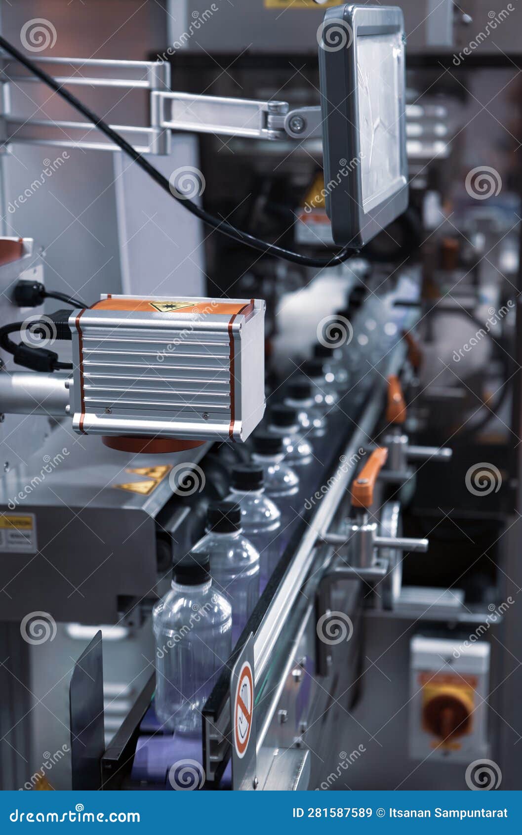 Liquid Filling and Bottle Capping Machine Stock Image - Image of ...