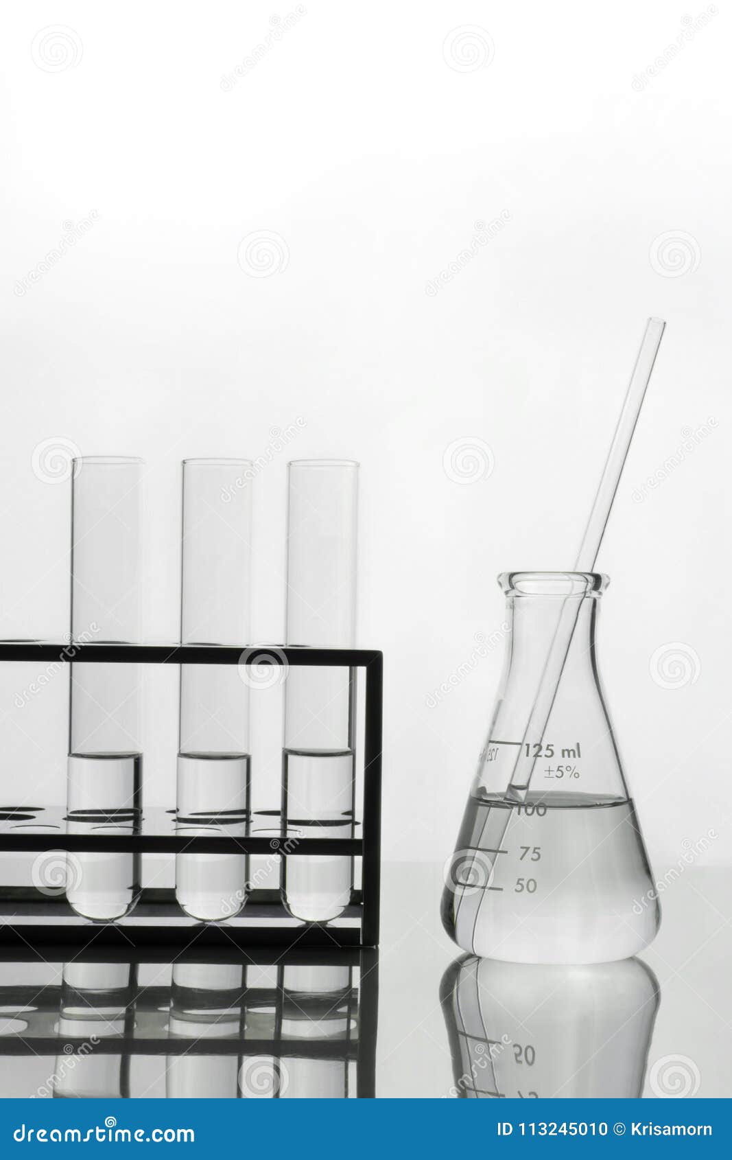Liquid in Flask and Test Tubes Stock Photo - Image of equipment ...