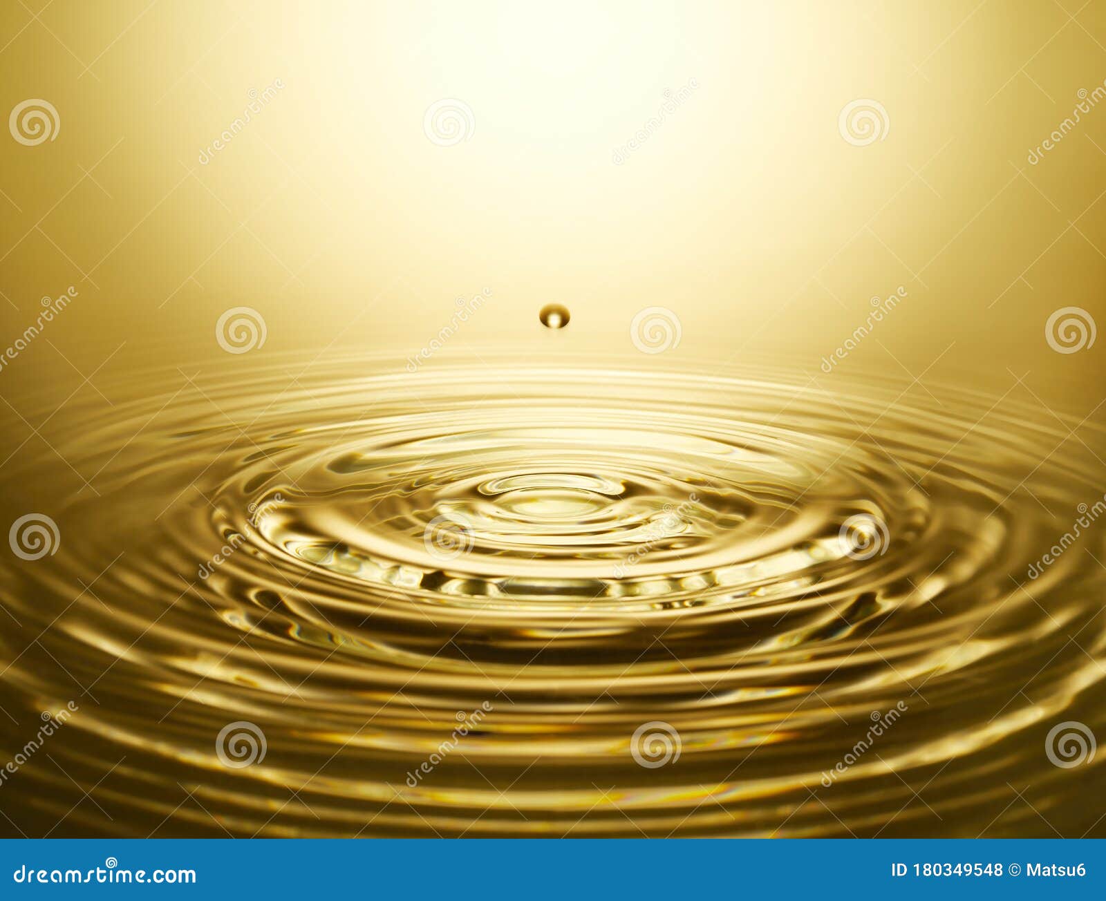 Golden water ripple # 2 stock photo. Image of ripple - 180349548