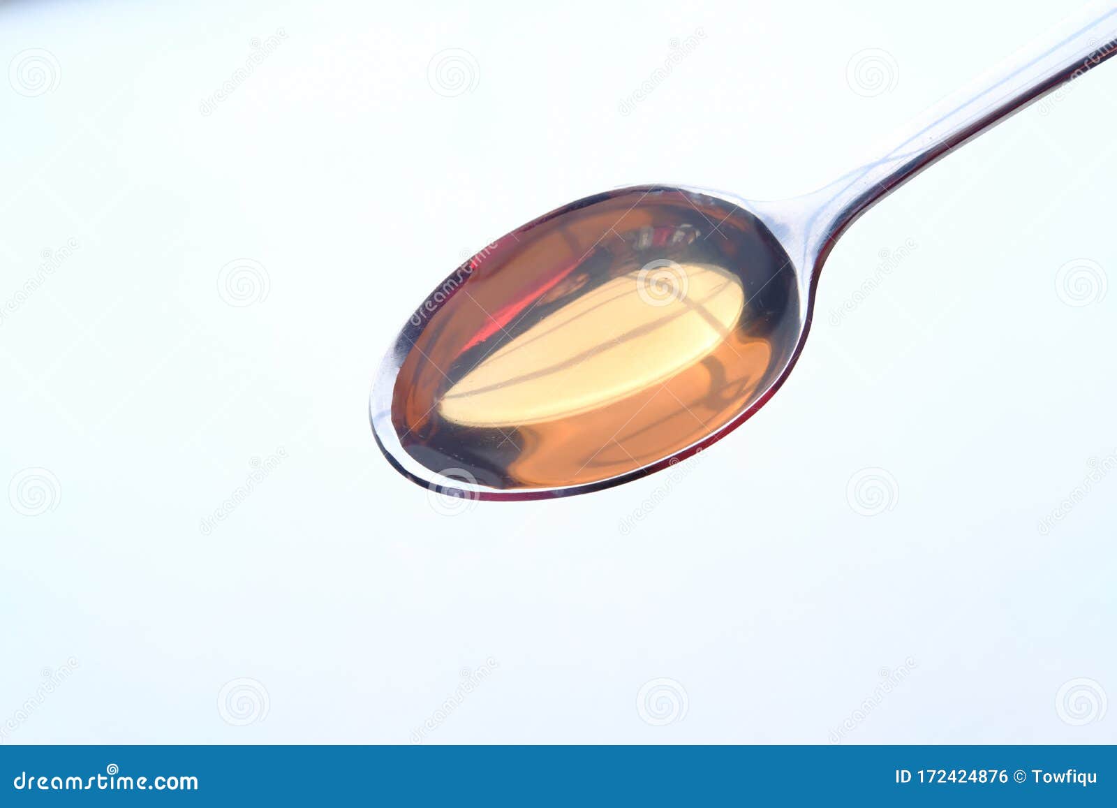 Liquid Medicine on Spoon Isolated with White Stock Photo - Image of ...
