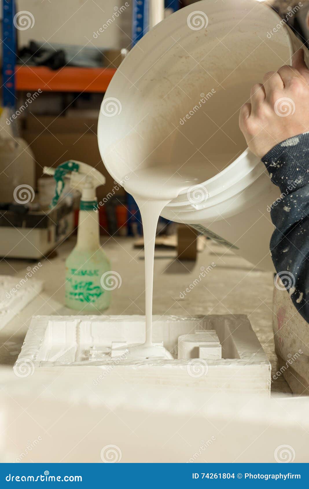 Liquid Plaster Poured Onto Open Mold Stock Photo - Image of splatter ...