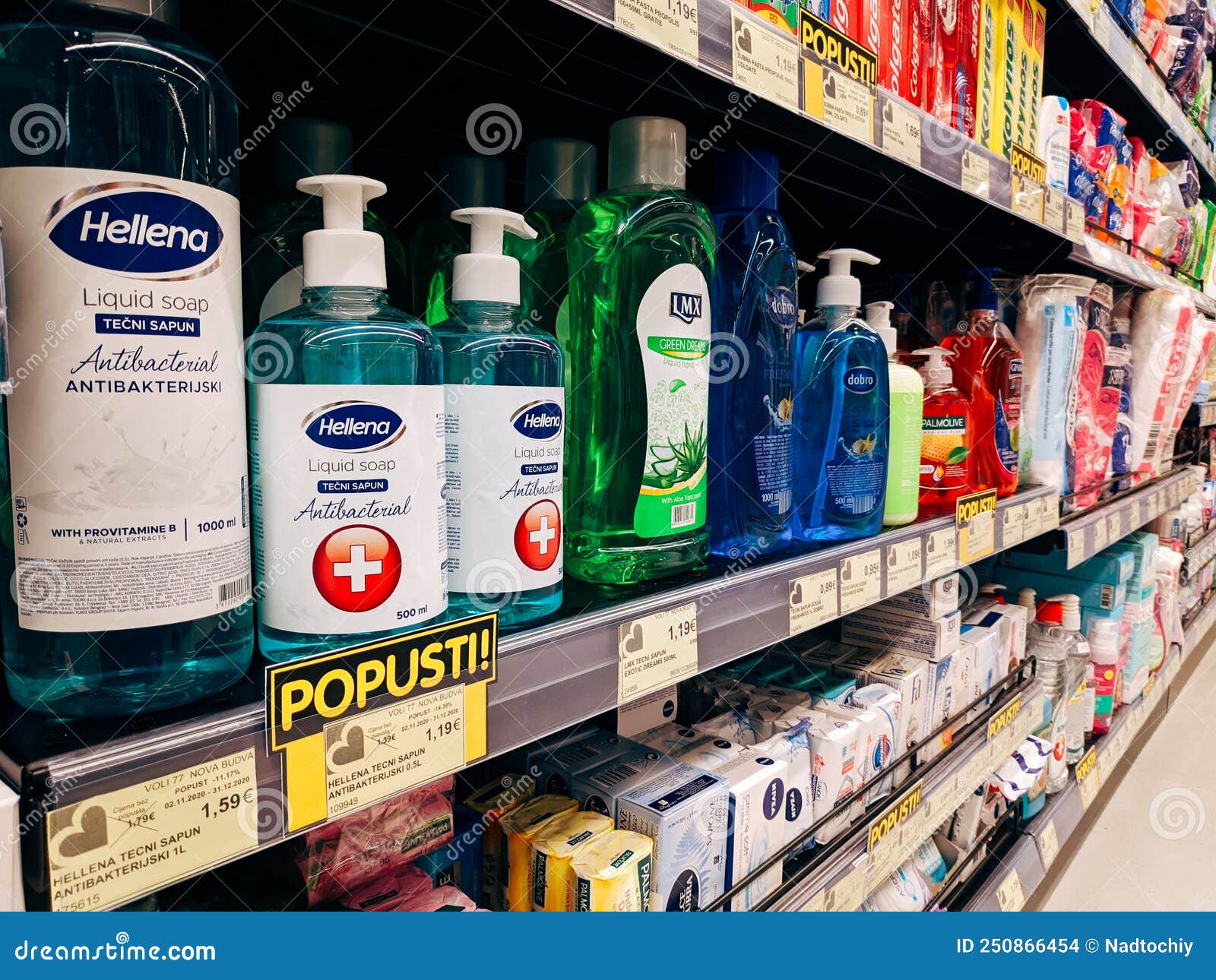 Liquid and Solid Soap Stands on a Shelf in a Supermarket Editorial ...