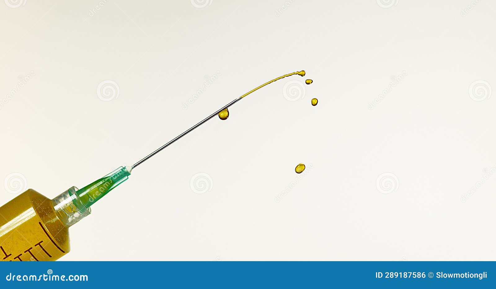 Liquid Squirting from Needle Against White Background Stock Photo ...