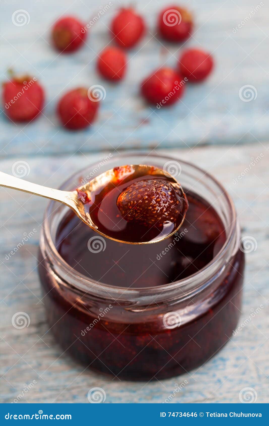 Liquid Strawberry Jam in a Jar with a Spoon Stock Photo - Image of ...