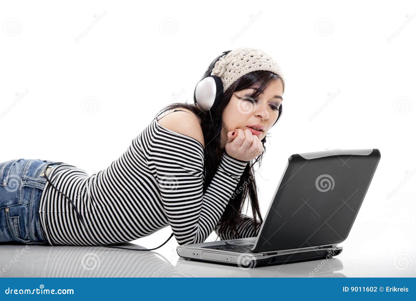 Listen Music with a Laptop stock photo. Image of audio - 9011602