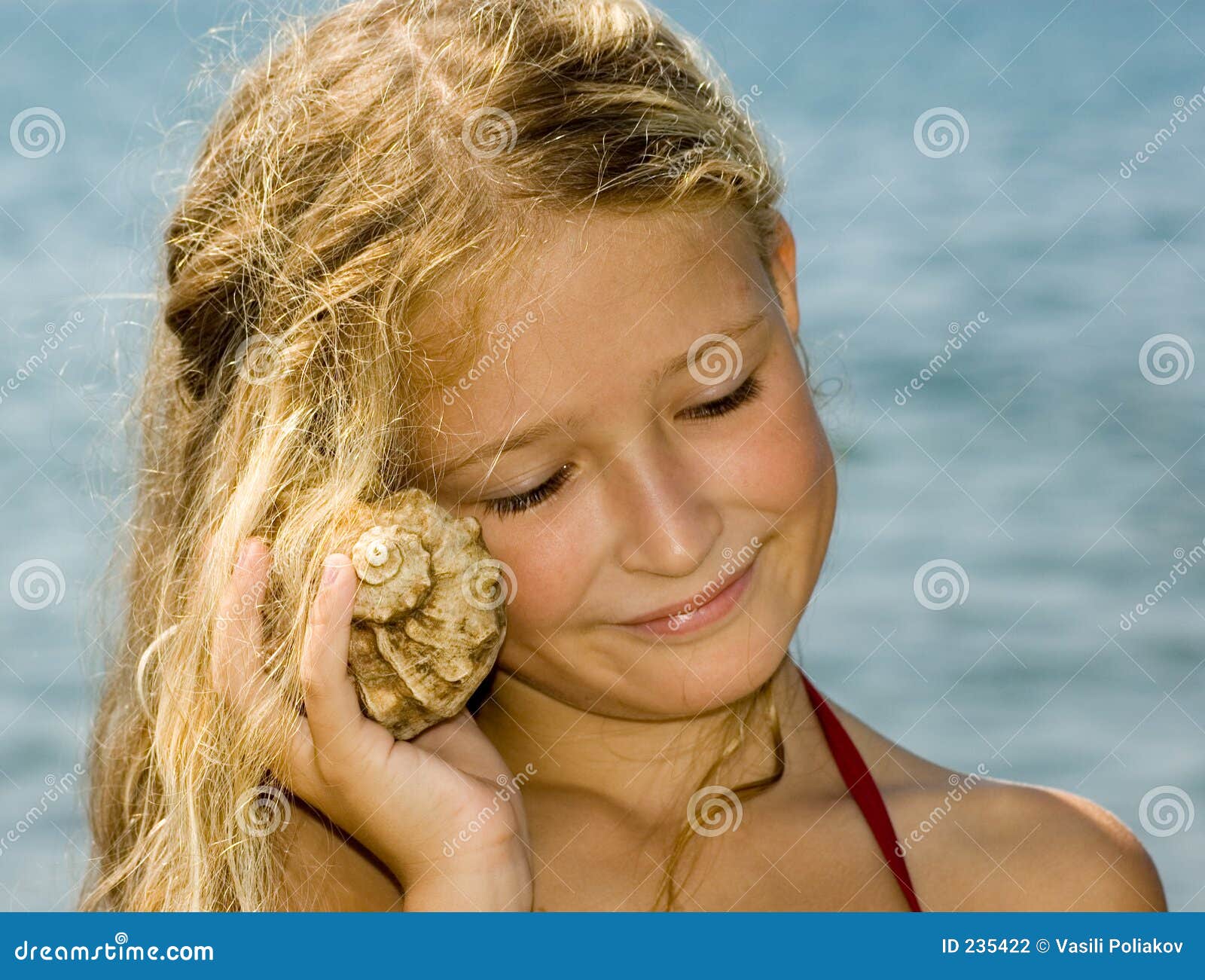 Listen the ocean stock photo. Image of bikini, shell, fresh - 235422